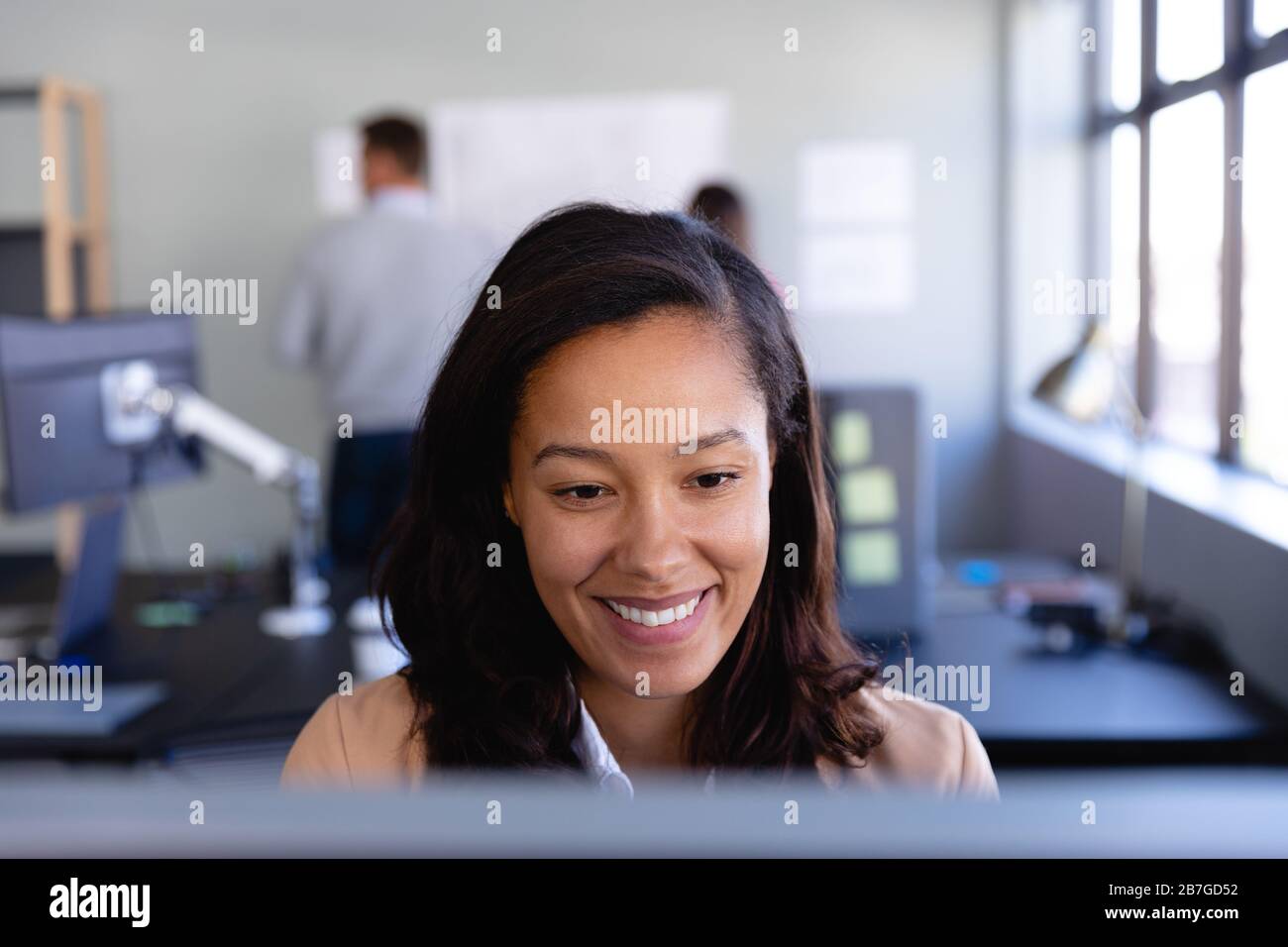 African woman working office hi-res stock photography and images - Alamy