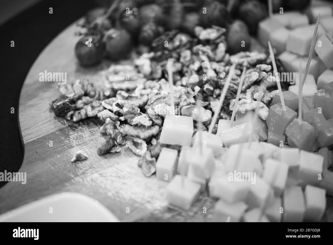 Cheese plate white background Black and White Stock Photos & Images - Alamy