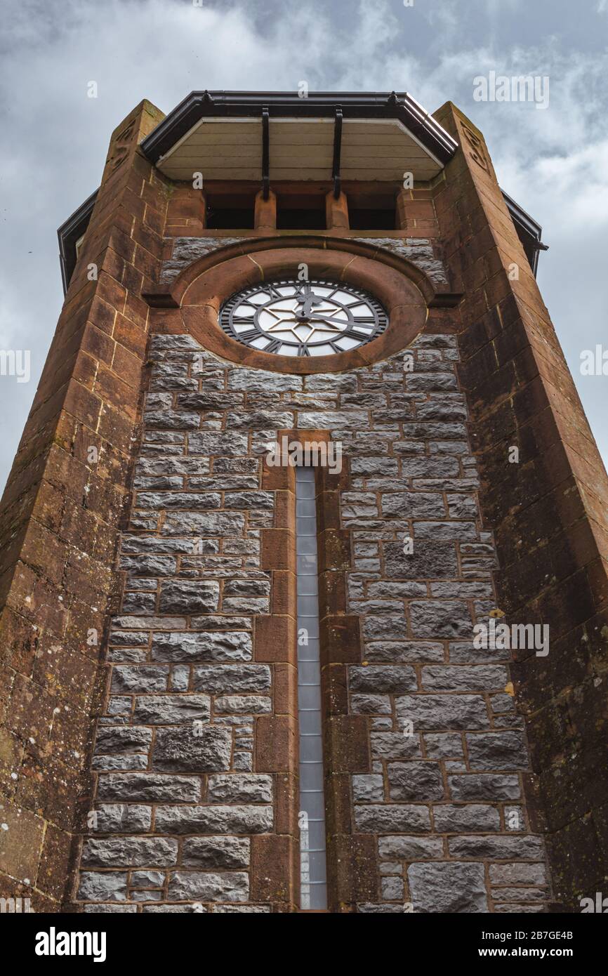 The clock tower in Grange-over-sands in a close up from the base Stock ...