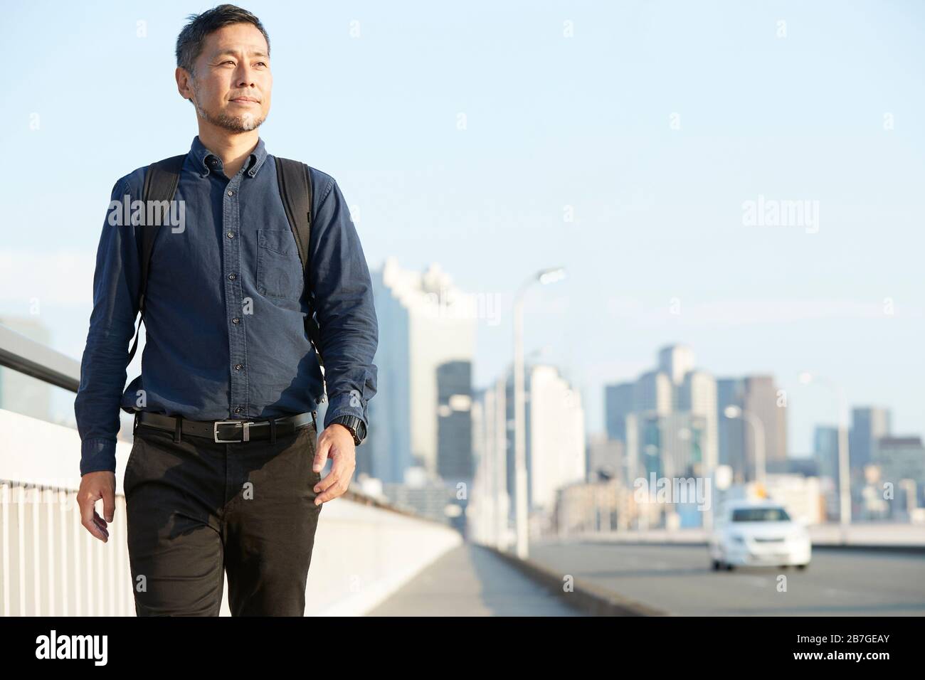 Mature Japanese man downtown Osaka, Japan Stock Photo - Alamy