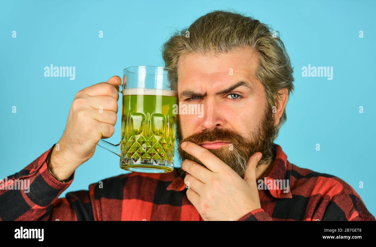 serious homebrewer. recreation. Man hold glass of beer. hipster at bar ...