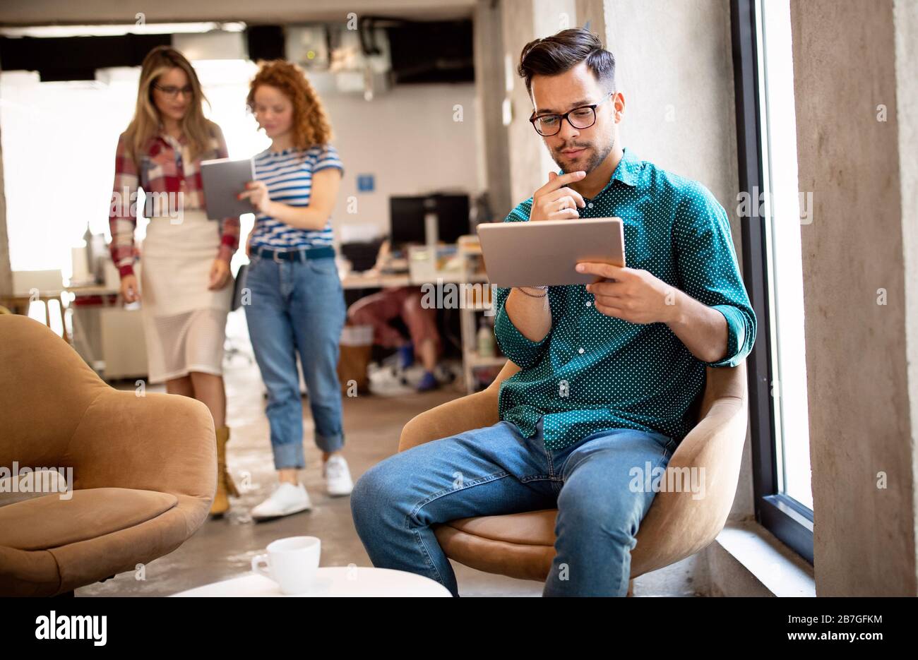 Happy creative team in office. Business, startup, design, people and ...