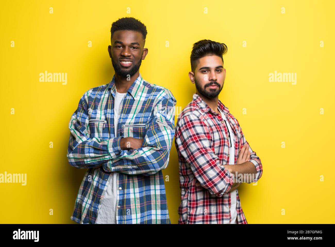 Portrait two brothers standing back hi-res stock photography and images ...