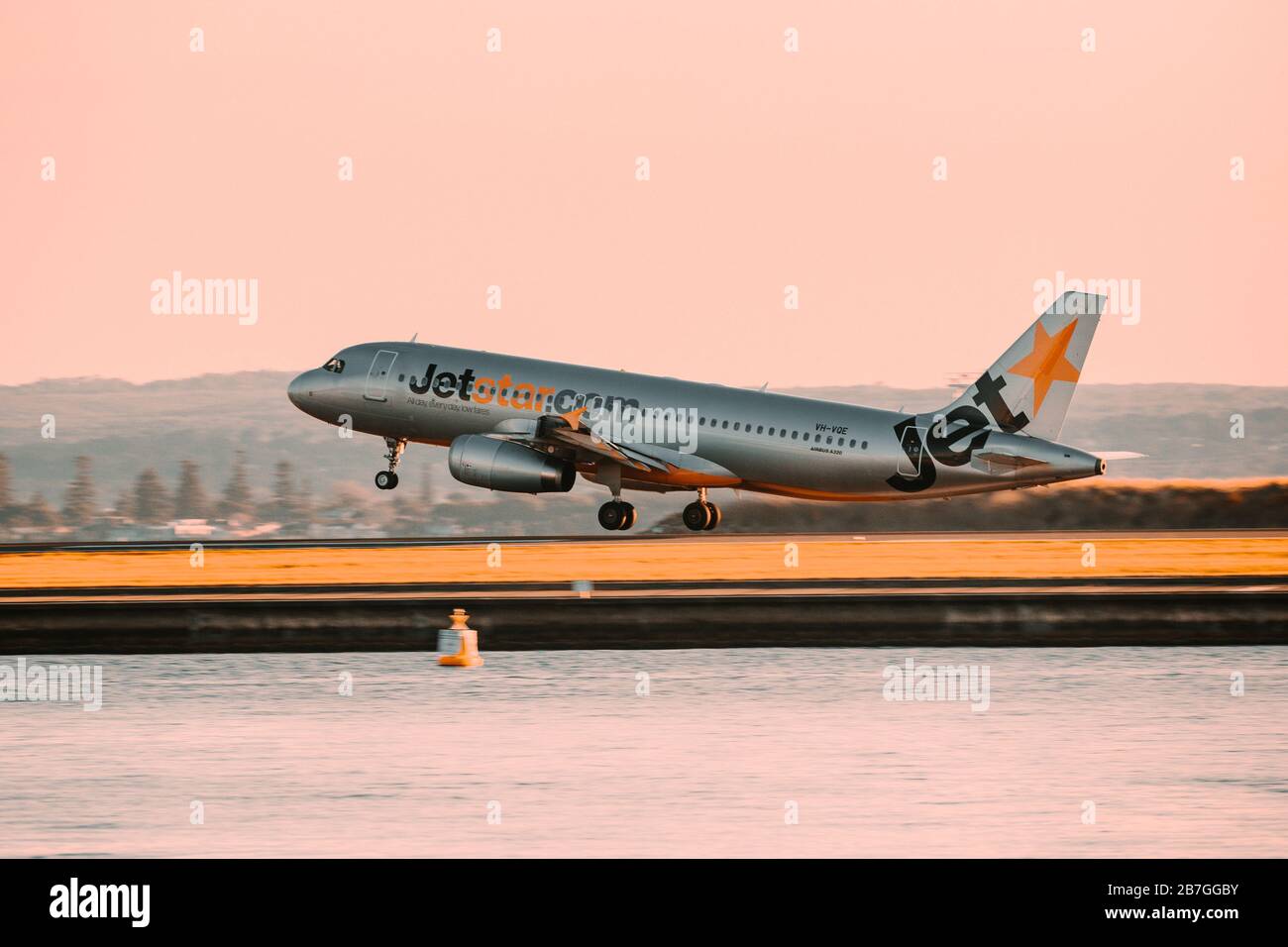 Jetstar Plane Taking Off Stock Photo - Alamy