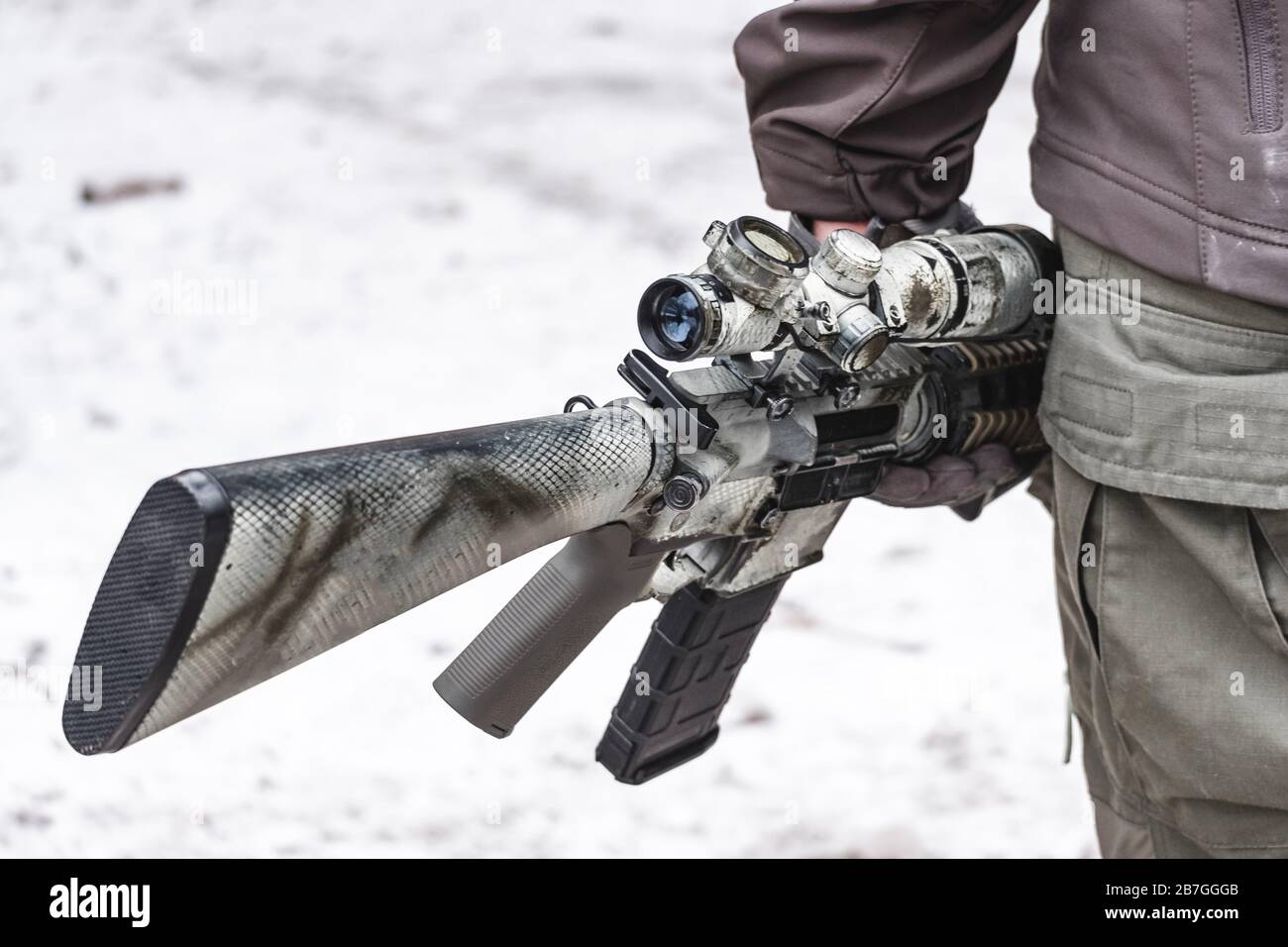 The military carries a rifle with an eye. Close up Stock Photo - Alamy