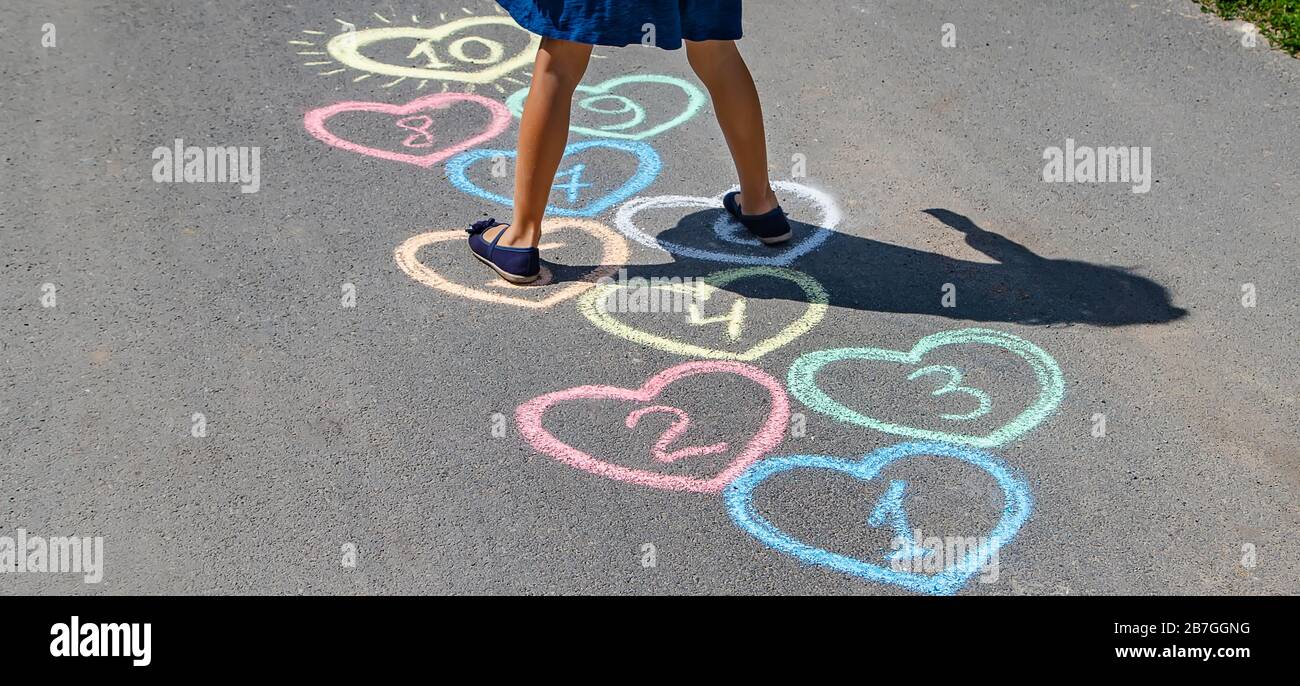 Children's hopscotch game on the pavement. selective focus. nature ...