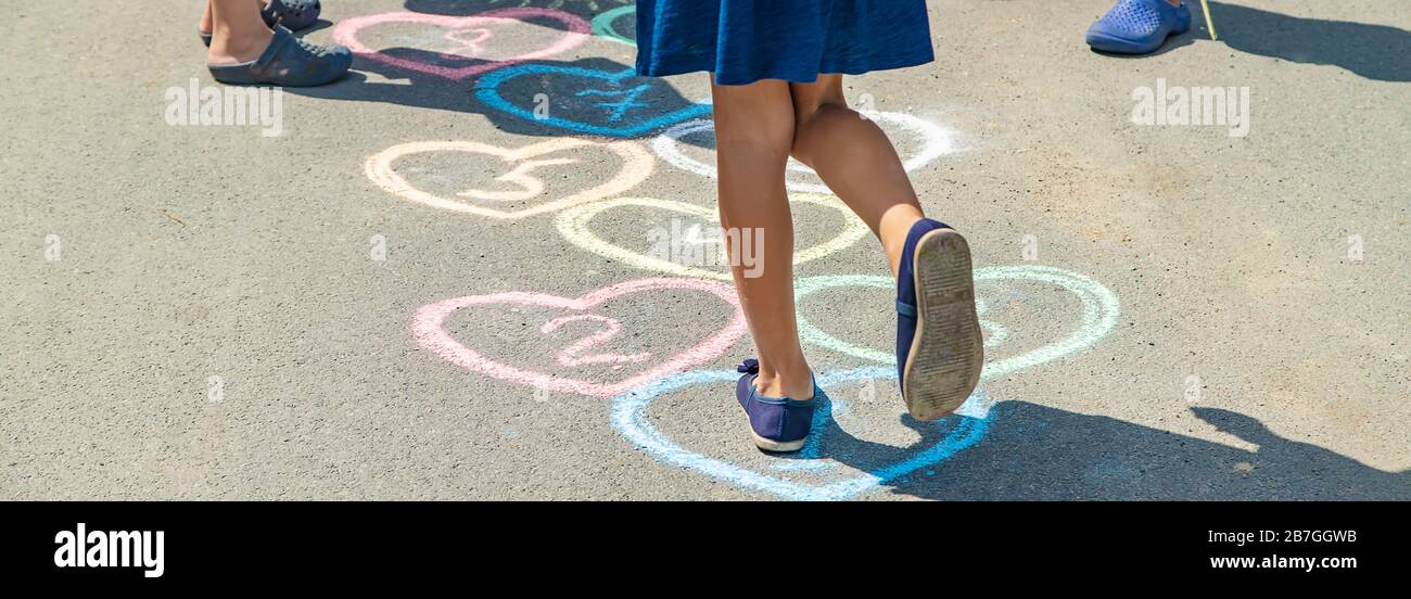 Children's hopscotch game on the pavement. selective focus. nature ...