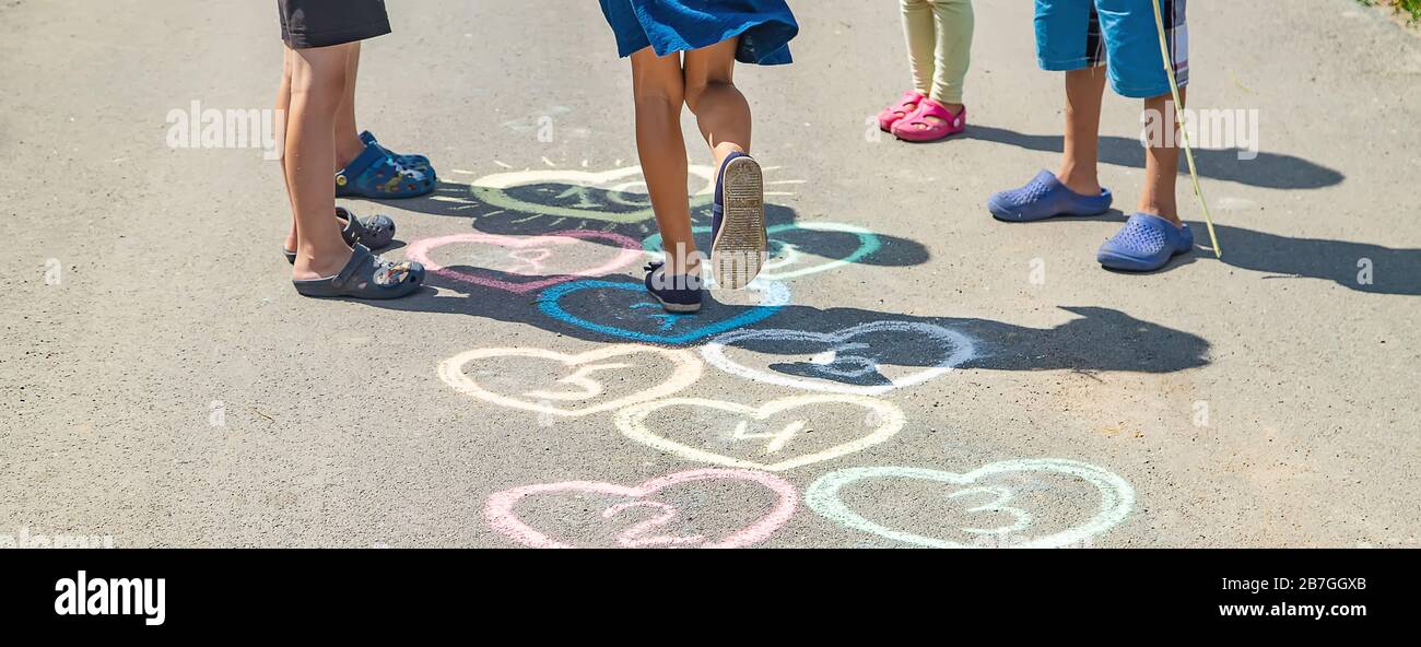 Children's hopscotch game on the pavement. selective focus. nature ...