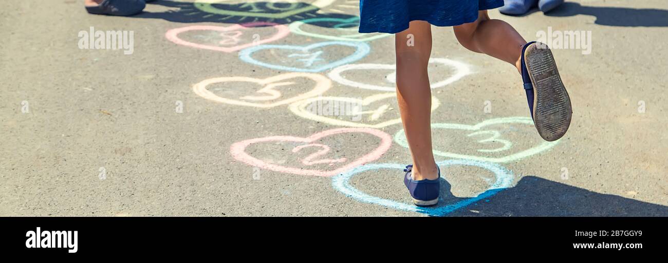 Children's hopscotch game on the pavement. selective focus. nature ...