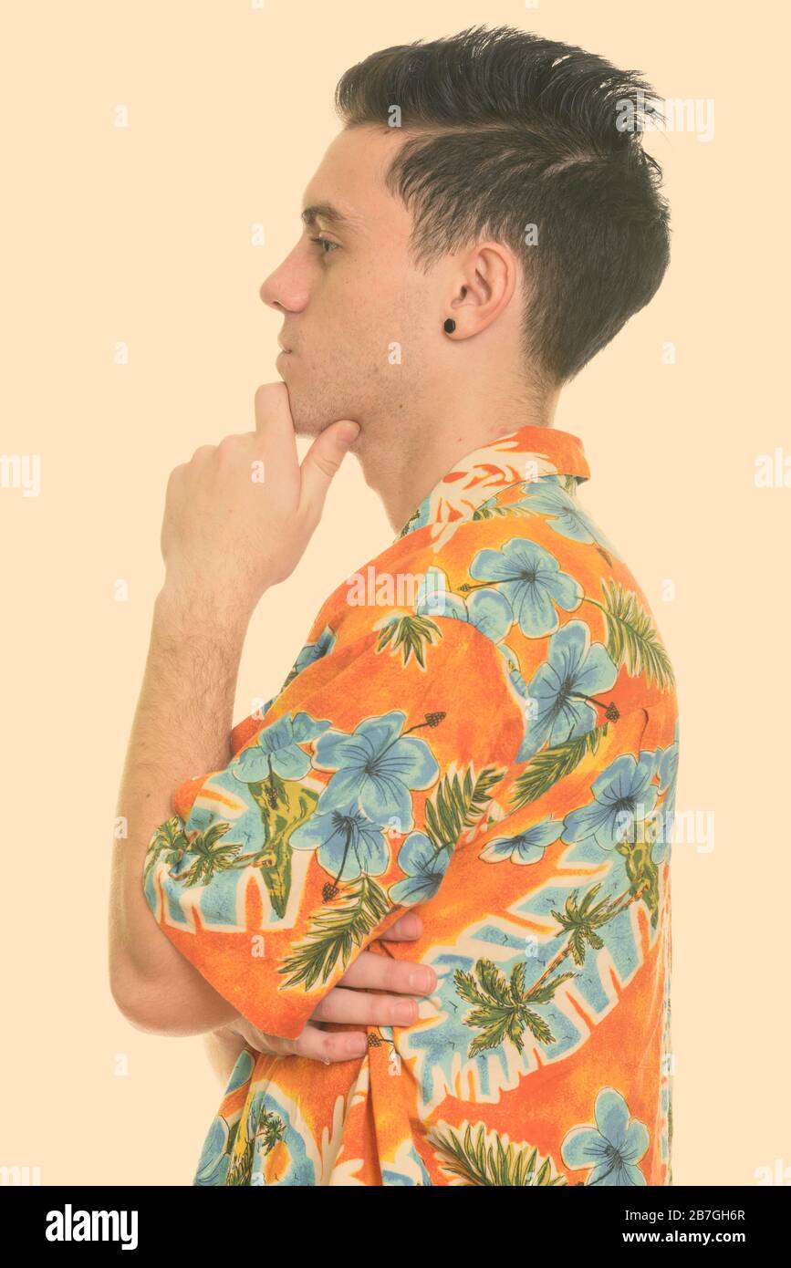 Profile view of young man thinking Stock Photo - Alamy