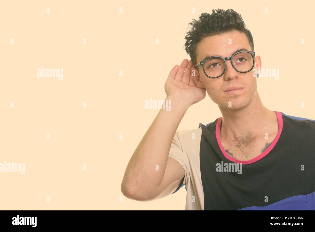 Studio shot nerd man listening hi-res stock photography and images - Alamy