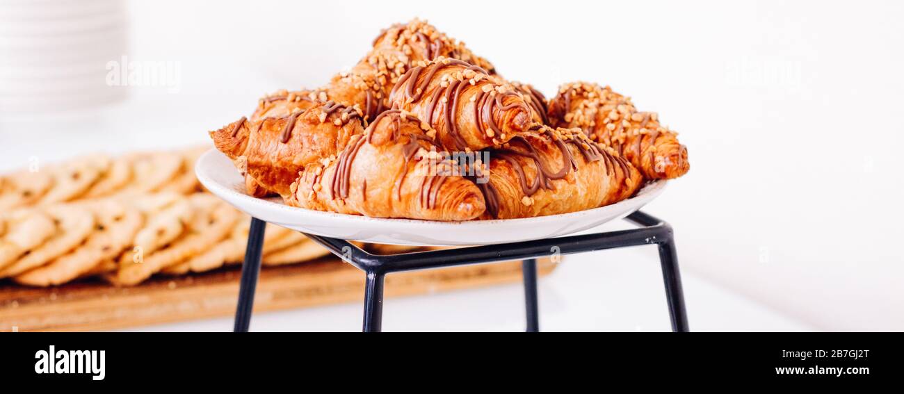 Pastry buffet served at charity event, sweet food and dessert table ...