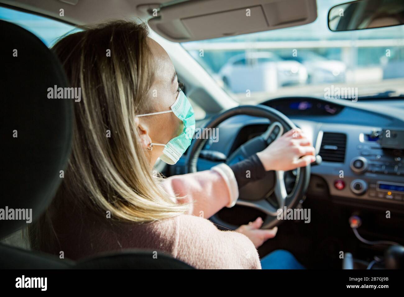 Woman breathing mask car hi-res stock photography and images - Alamy