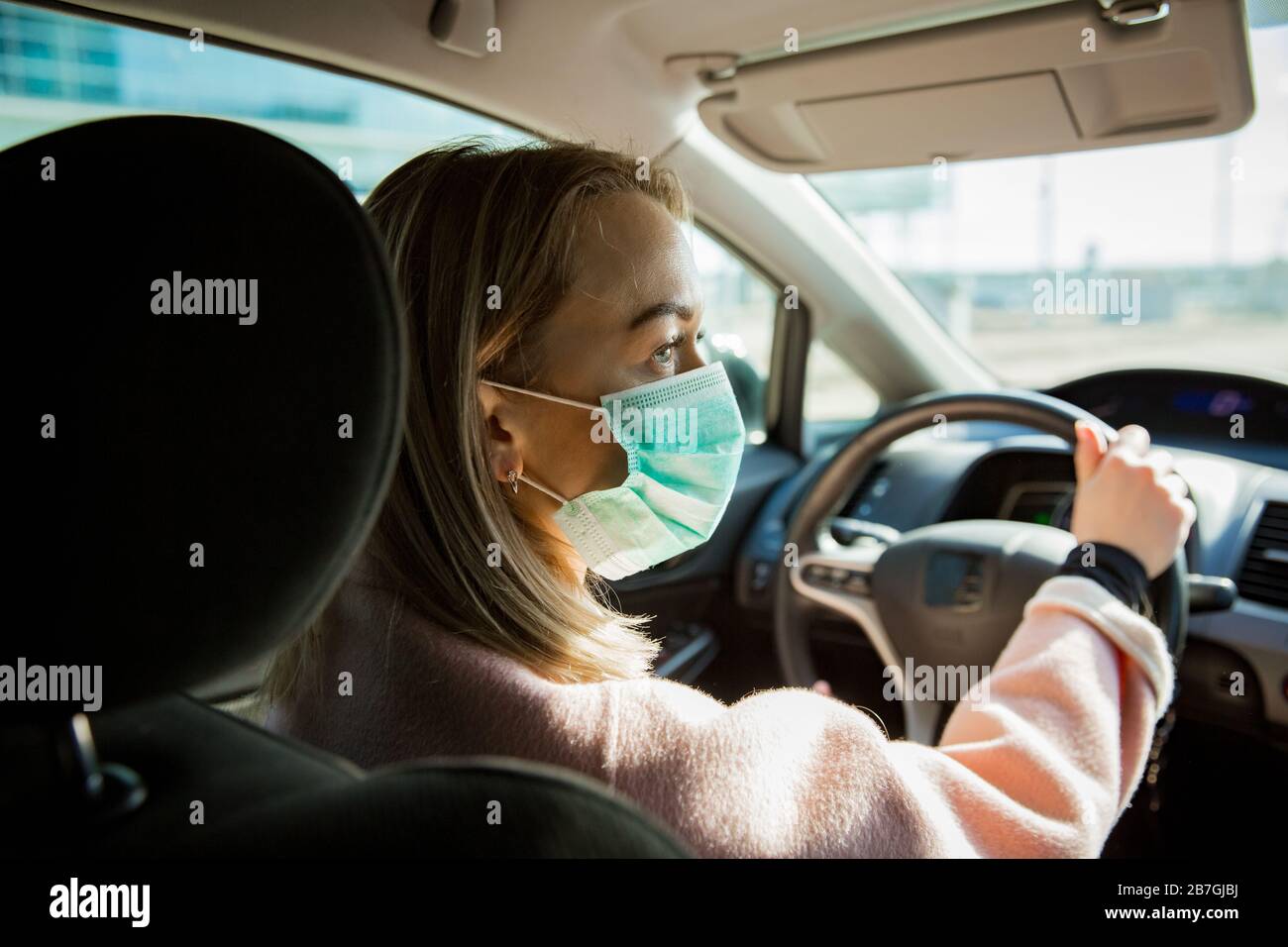 Woman breathing mask car hi-res stock photography and images - Alamy