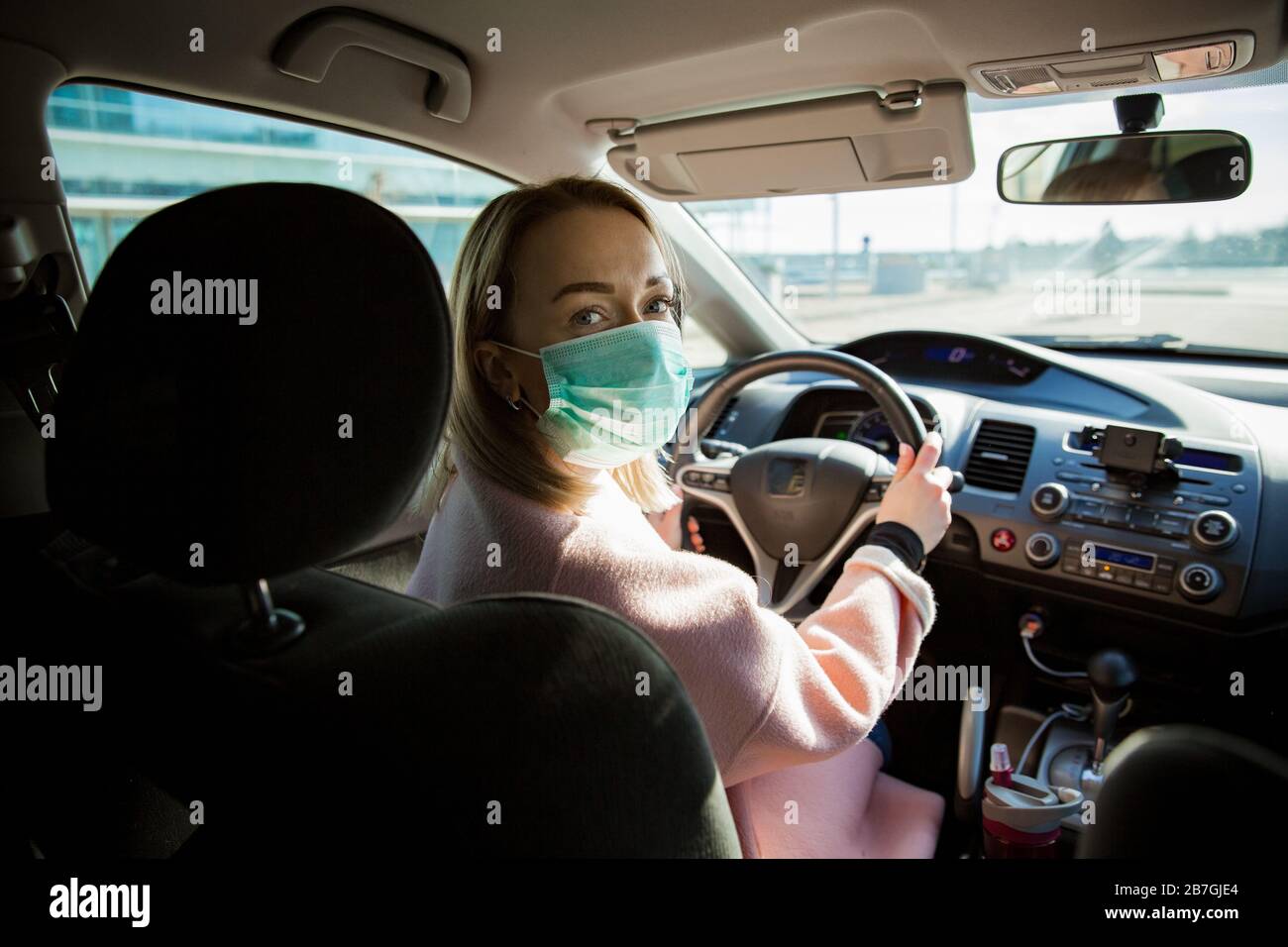 Woman driver mask car hi-res stock photography and images - Alamy