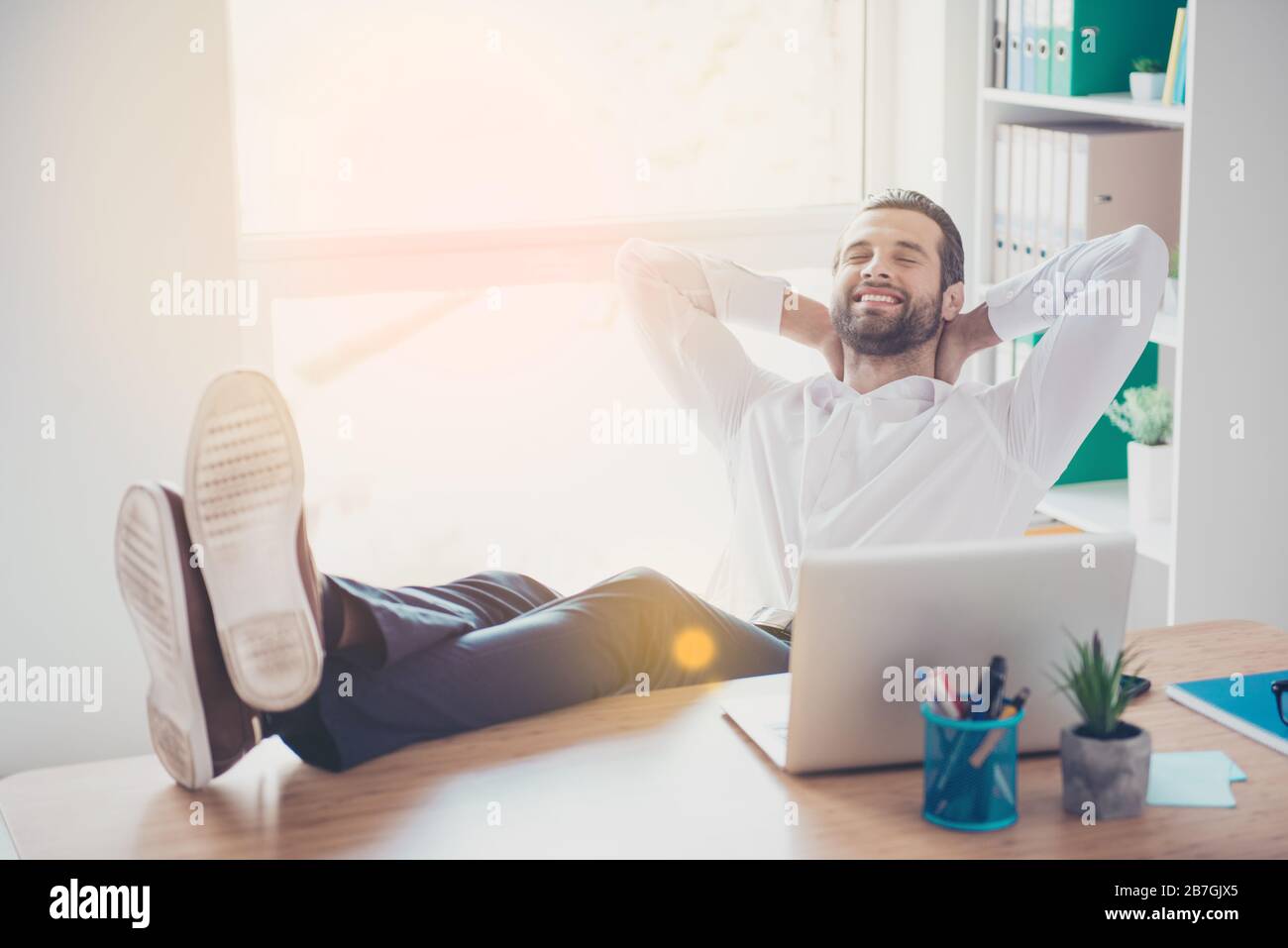 Putting legs on desk hi-res stock photography and images - Alamy