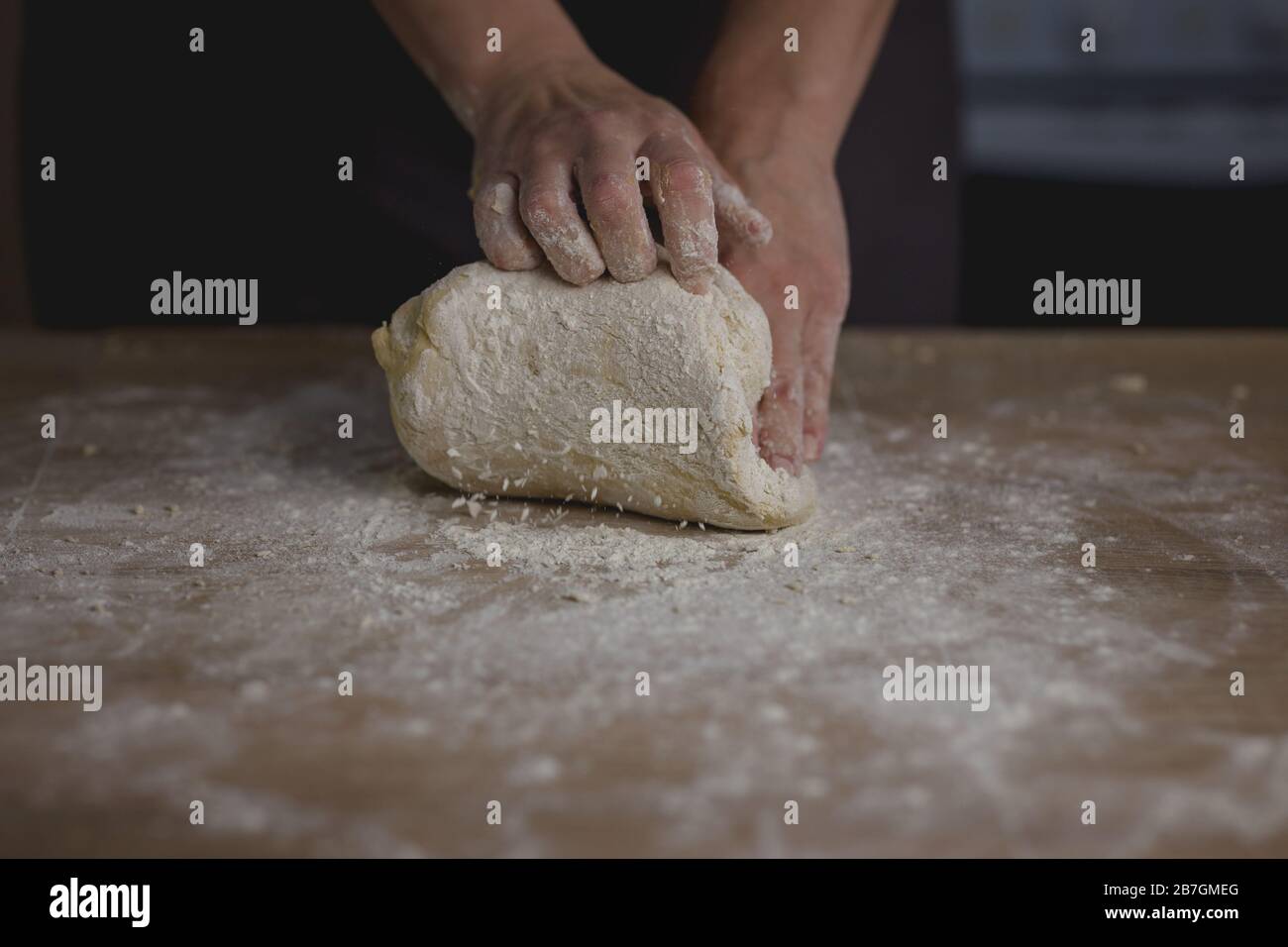 Female chef kneading bread hi-res stock photography and images - Alamy
