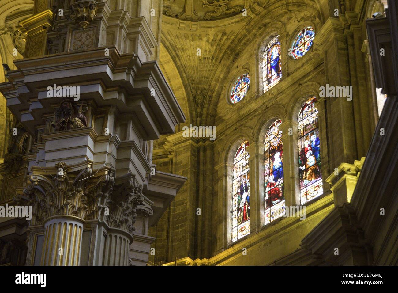 Big pillar and stained glass windows in Malaga Cathedral, Spain Stock ...