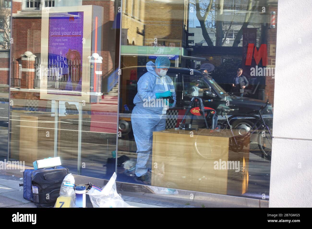 London, UK. 16th Mar, 2020. Ram raiders smash the front of Metro Bank in Kings Road, Chelsea in ...