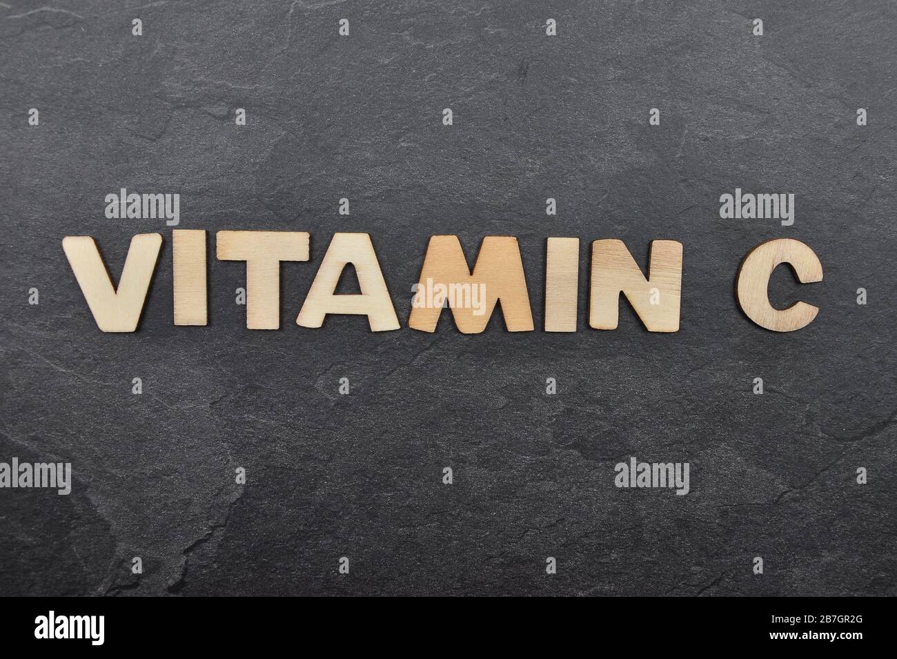 Term from wooden letters on slate board Stock Photo - Alamy