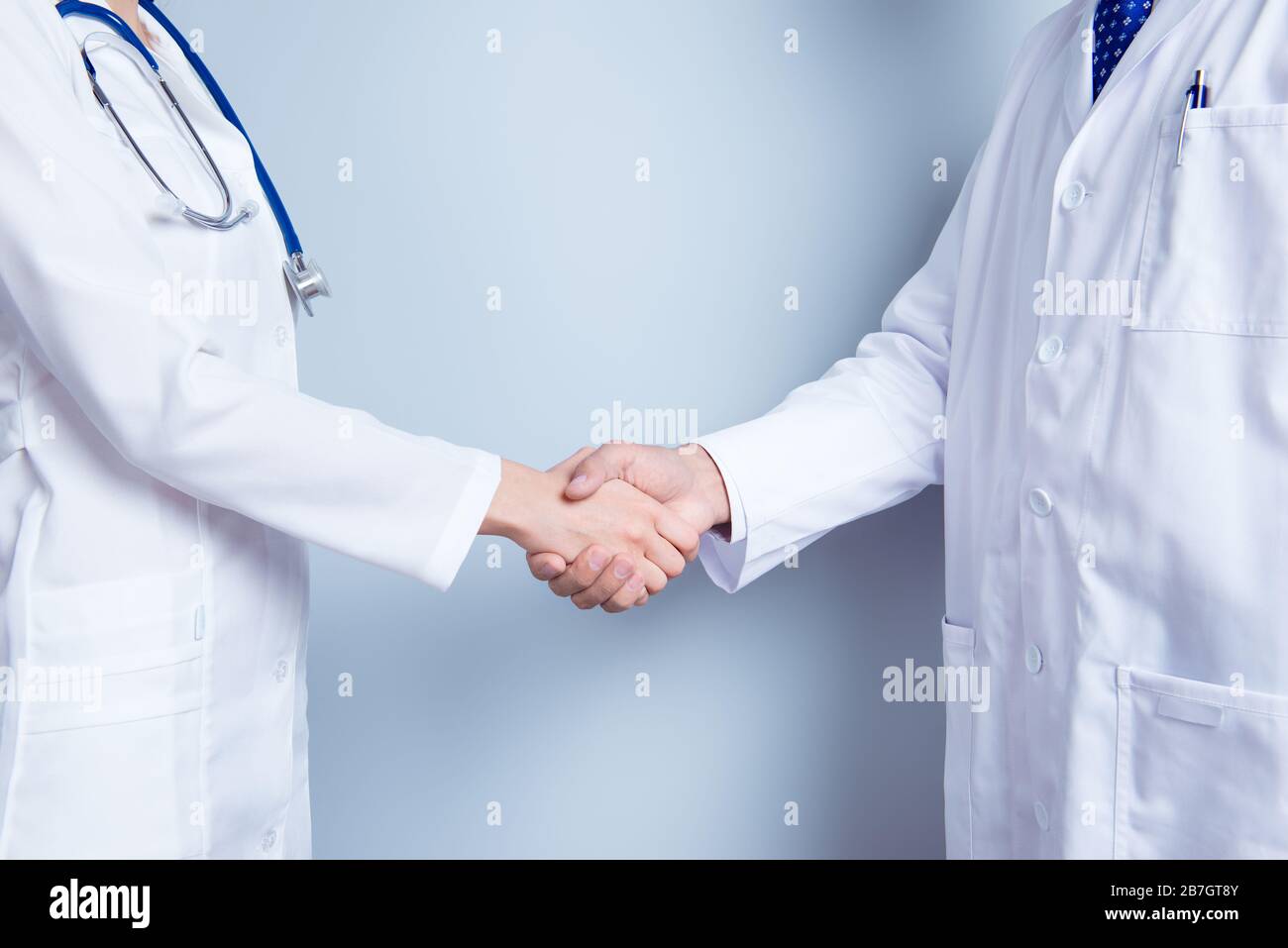 Deal Concept of collaboration in medicine. Close up photo of tw Stock ...