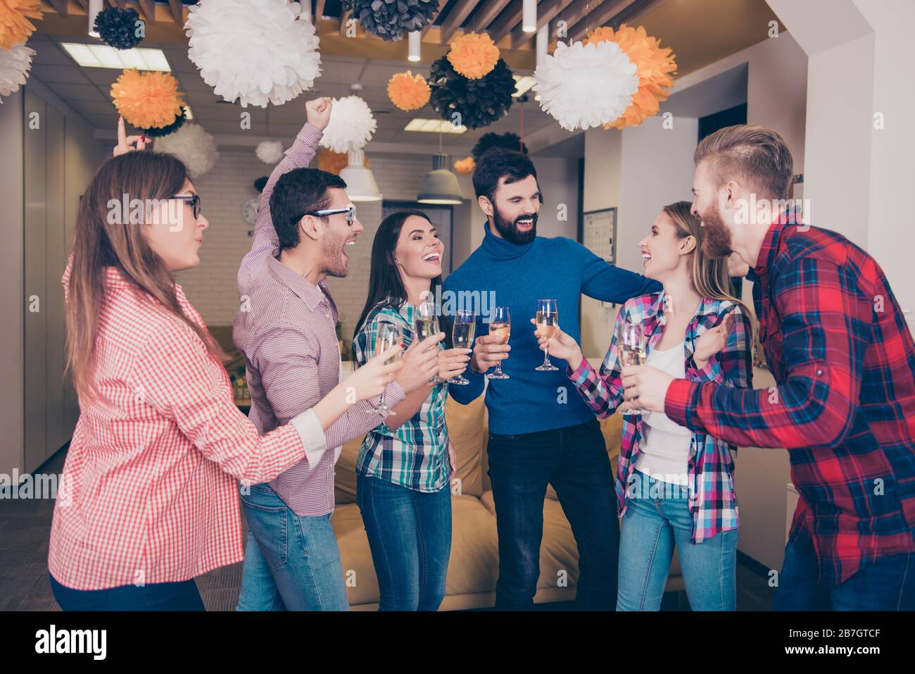 Happy cheerful student's team having party with champagne Stock Photo ...