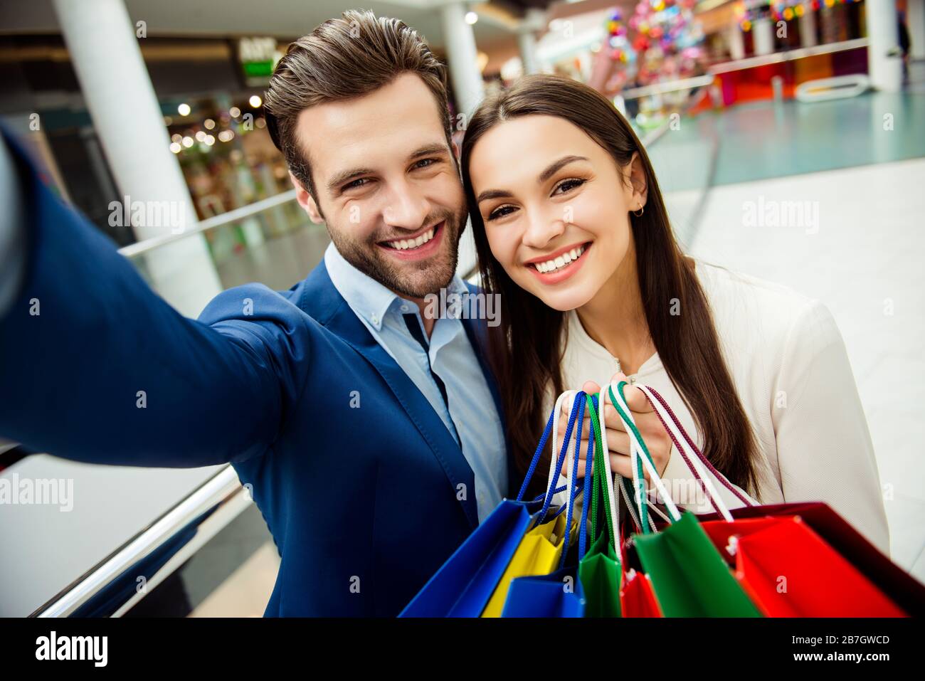 It's shopping time with sales and fun. Cute selfie portrait of cheerful ...