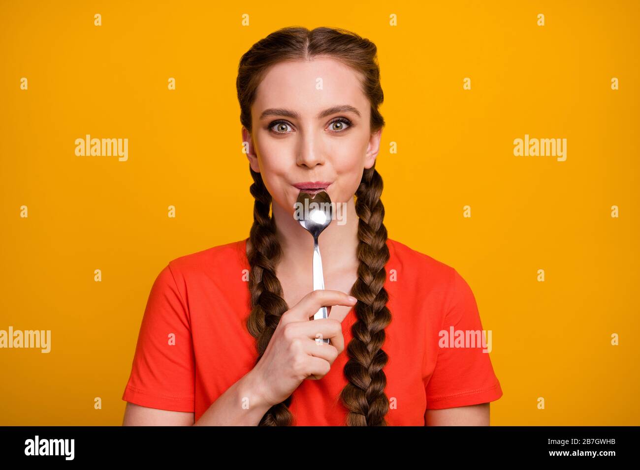 Teen girl spoon in mouth hi-res stock photography and images - Alamy