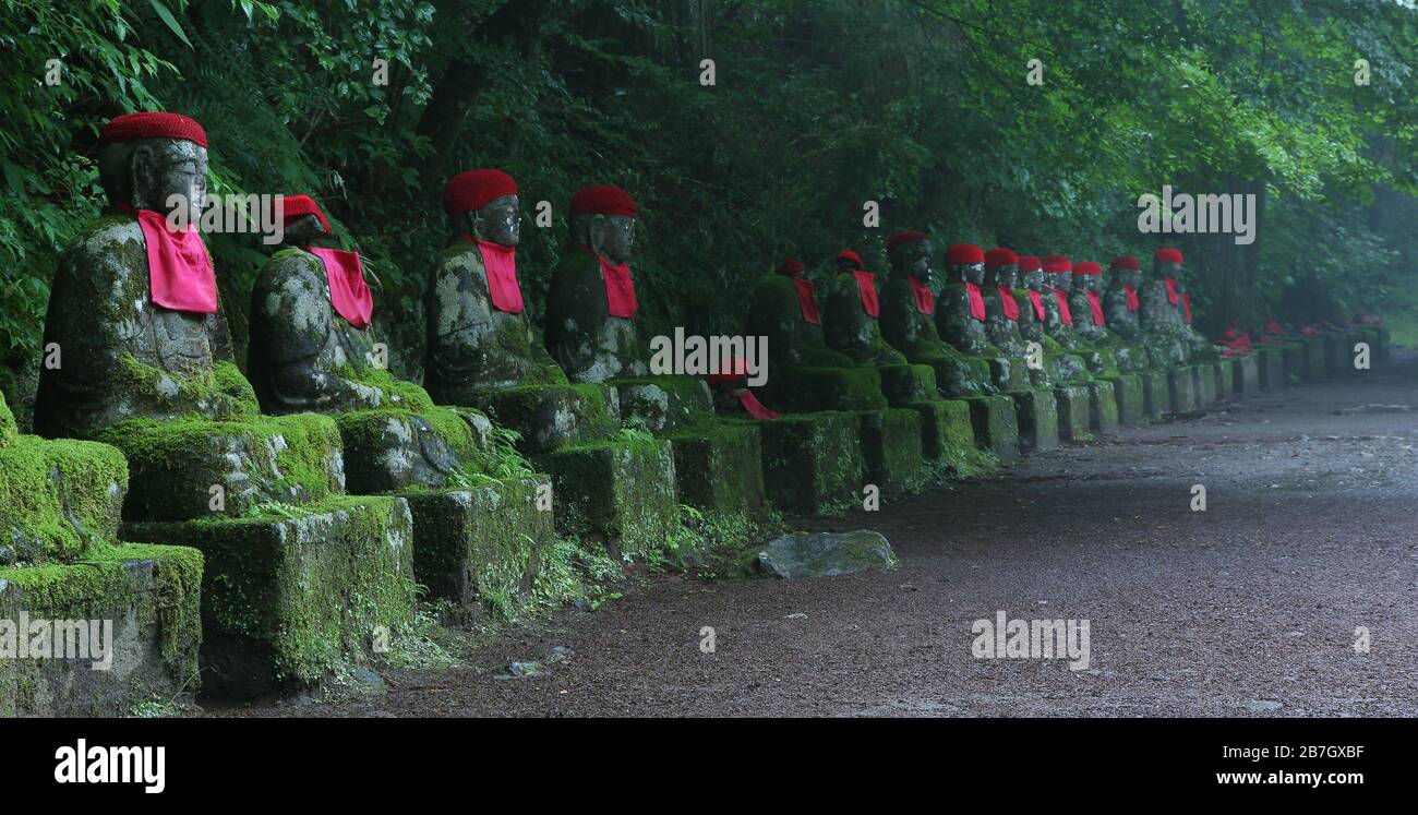 Aligned jizo buddhist statues in Nikko, Japan (Kanmangafuchi Abyss ...