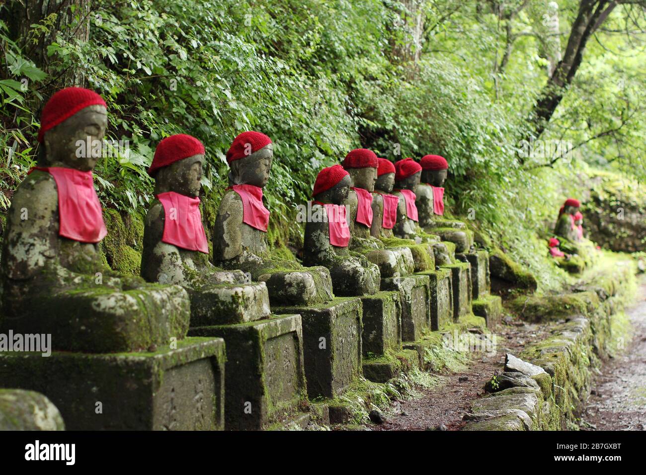 Aligned jizo buddhist statues in Nikko, Japan (Kanmangafuchi Abyss ...