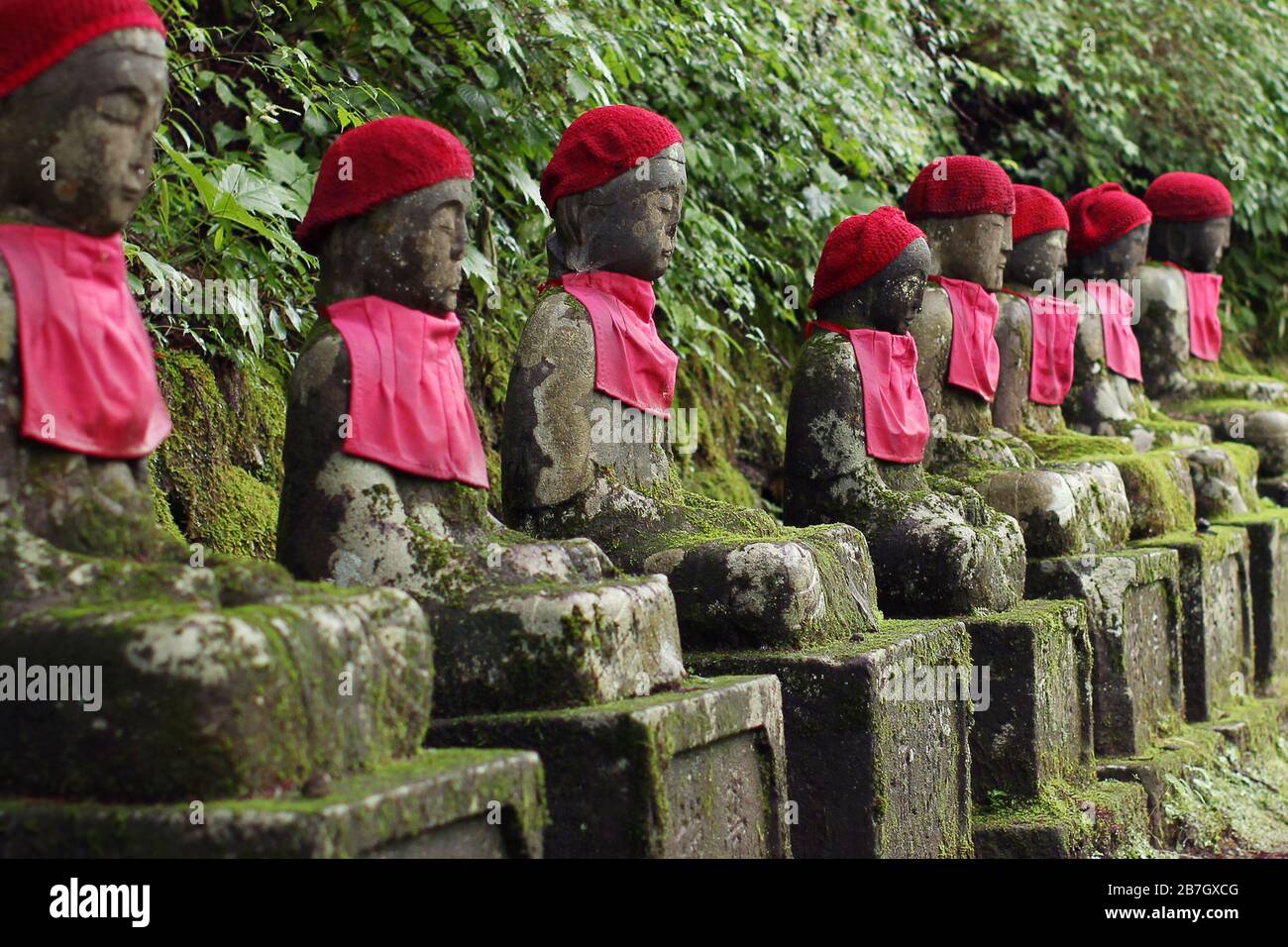 Aligned jizo buddhist statues in Nikko, Japan (Kanmangafuchi Abyss ...