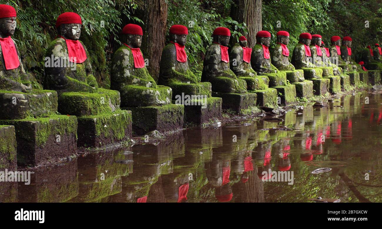 Aligned jizo buddhist statues in Nikko, Japan (Kanmangafuchi Abyss ...