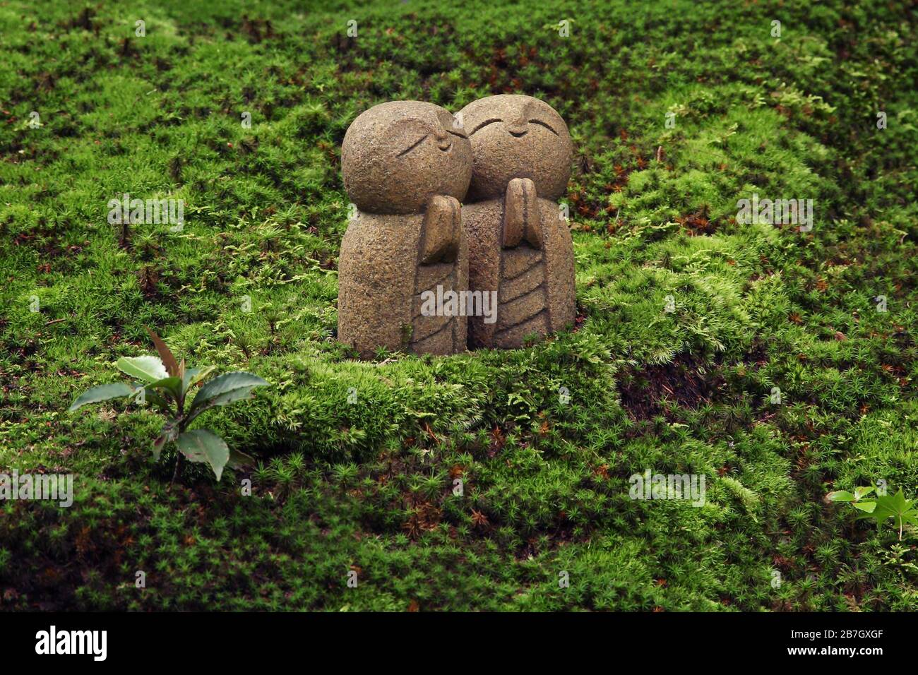 Small jizo buddhist statues in the moss (Shisen-do temple in Kyoto ...
