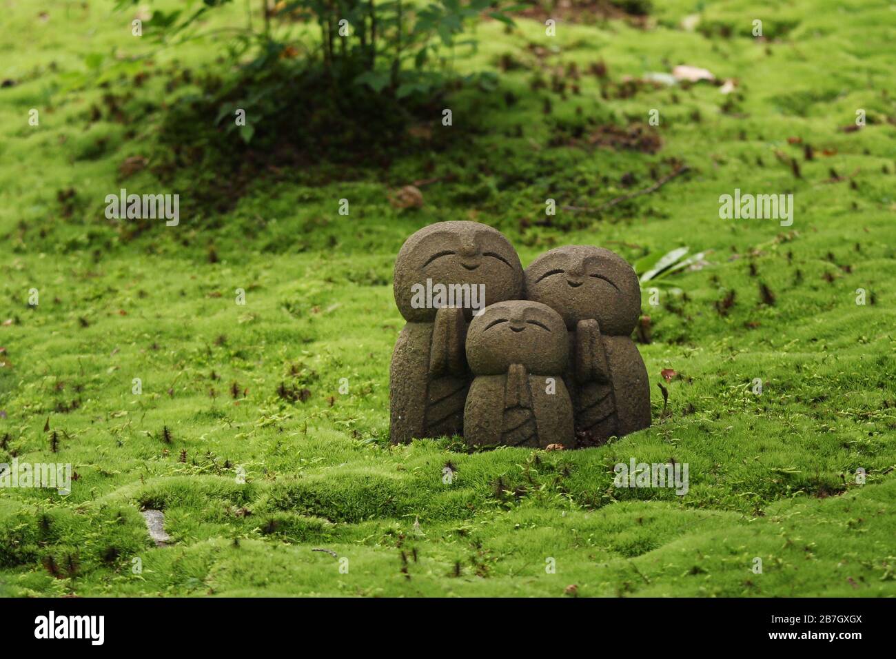 Small jizo buddhist statues in the moss (Shisen-do temple in Kyoto ...