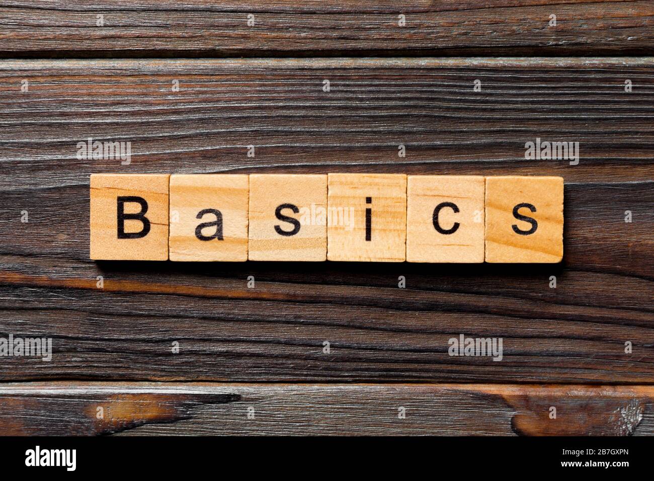BASICS word written on wood block. BASICS text on table, concept Stock ...