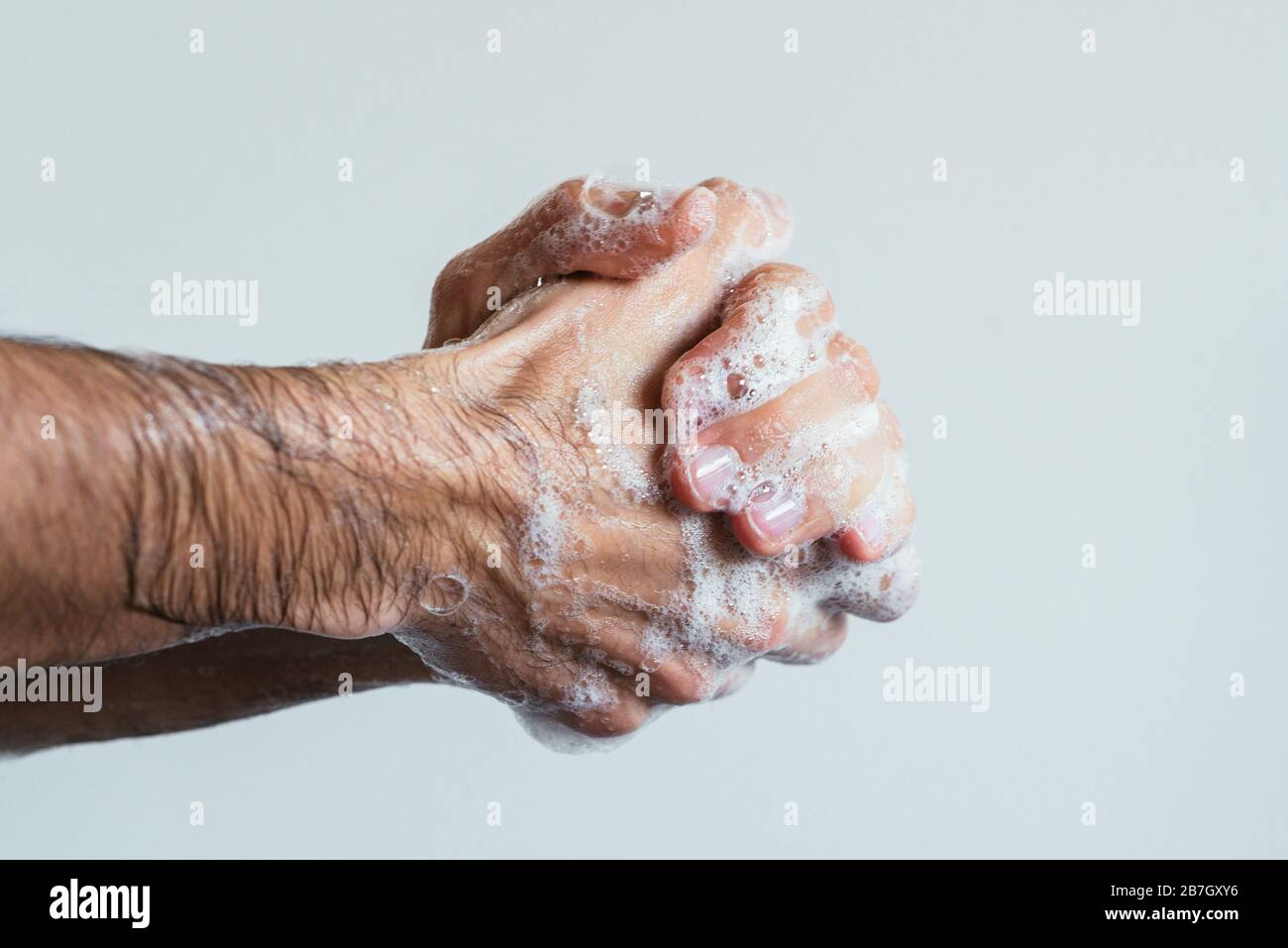 Man washing his hands. Close up Stock Photo - Alamy