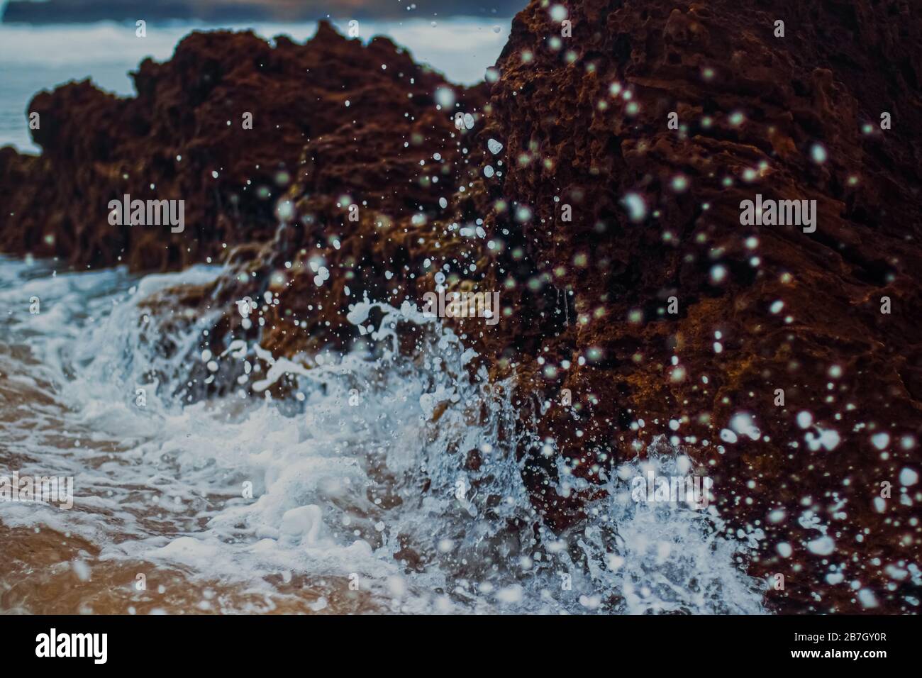 Storm in the ocean, sea waves crashing on rocks on the beach coast ...