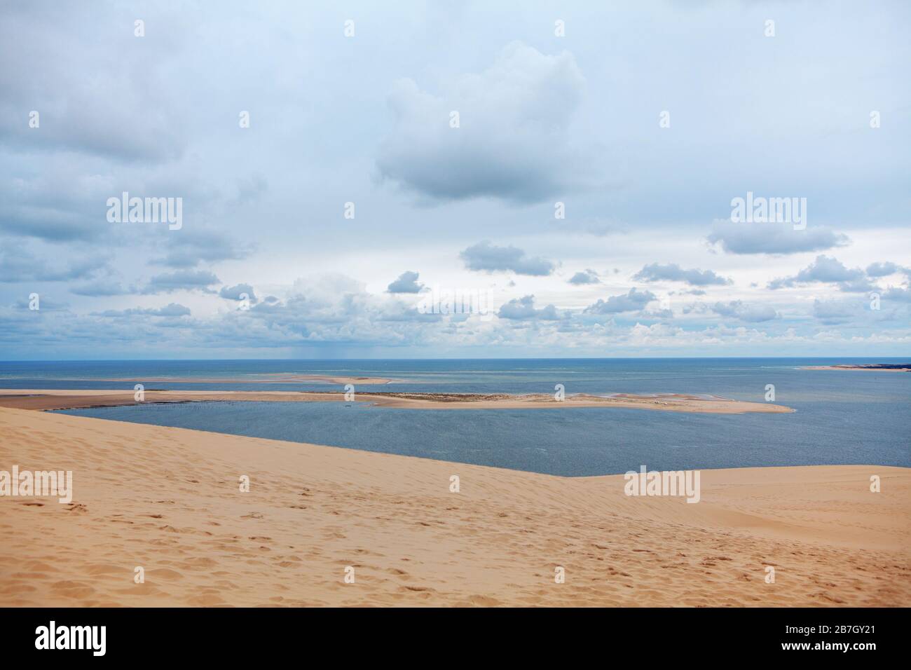 scenery with islet and sandy beach Stock Photo - Alamy