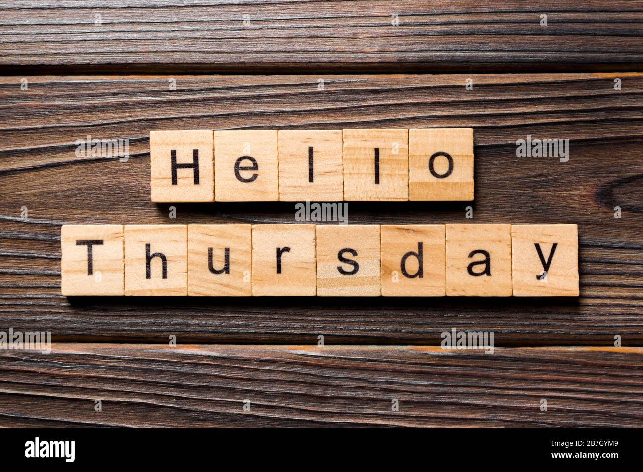 hello thursday word written on wood block. hello thursday text on ...