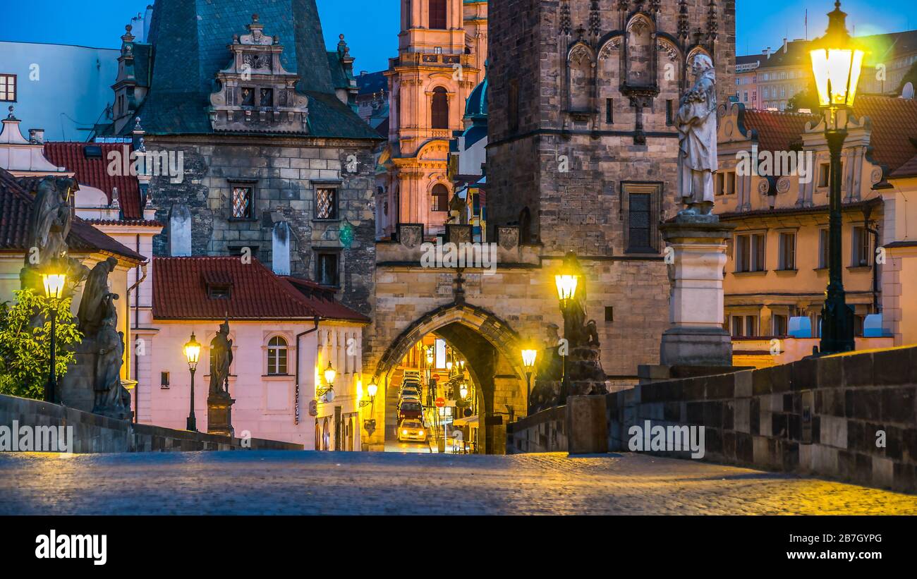 Architecture of Charles Bridge in Prague at early morning Stock Photo ...