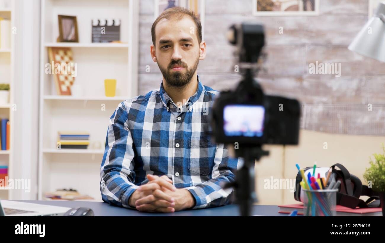 Famous young man recording a vlog for subscribers. Influencer using ...