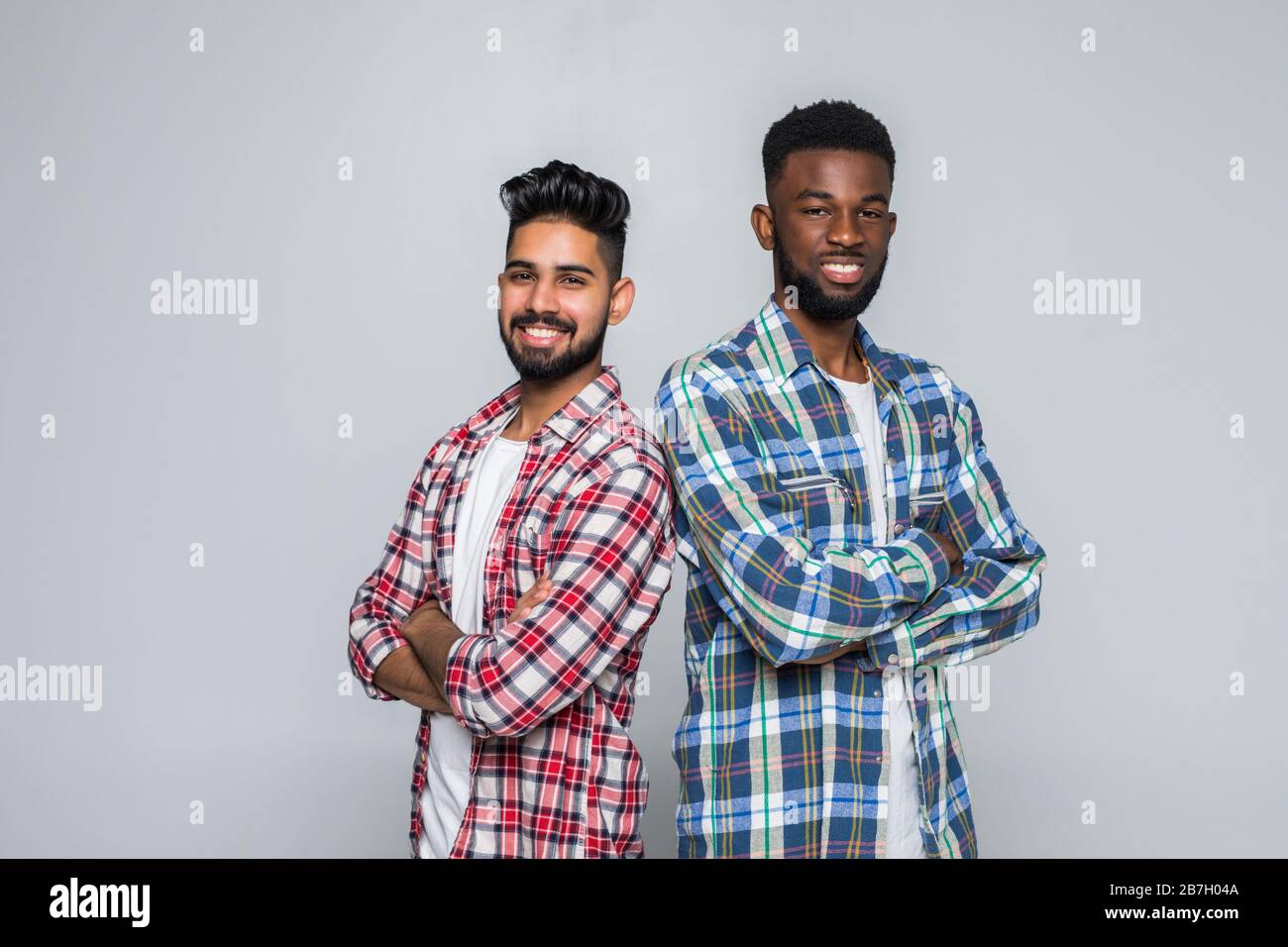 Portrait two brothers standing back hi-res stock photography and images ...