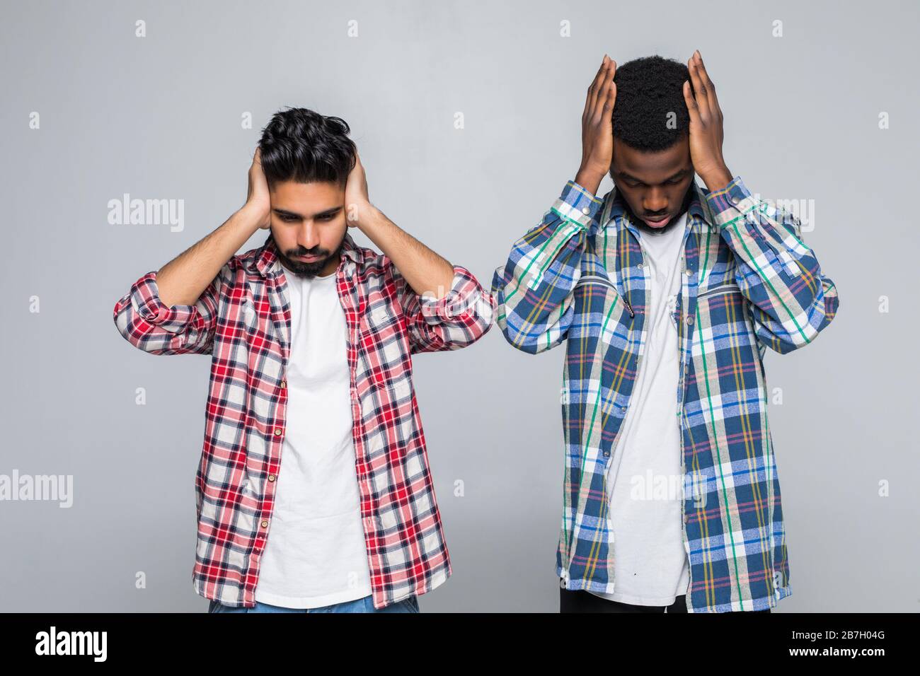 Two sad looking men hi-res stock photography and images - Alamy