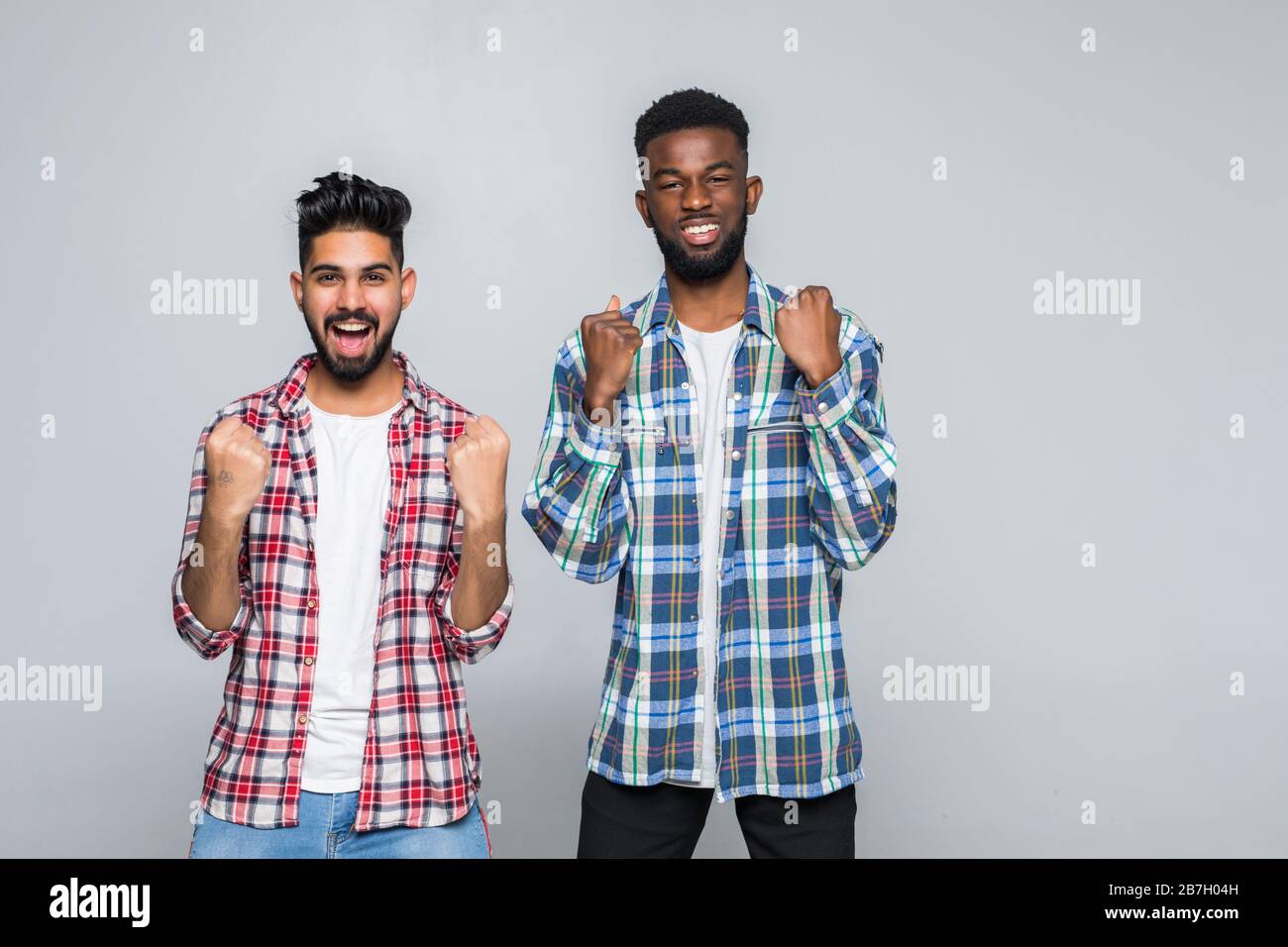 Two handsome men celebrating hi-res stock photography and images - Alamy