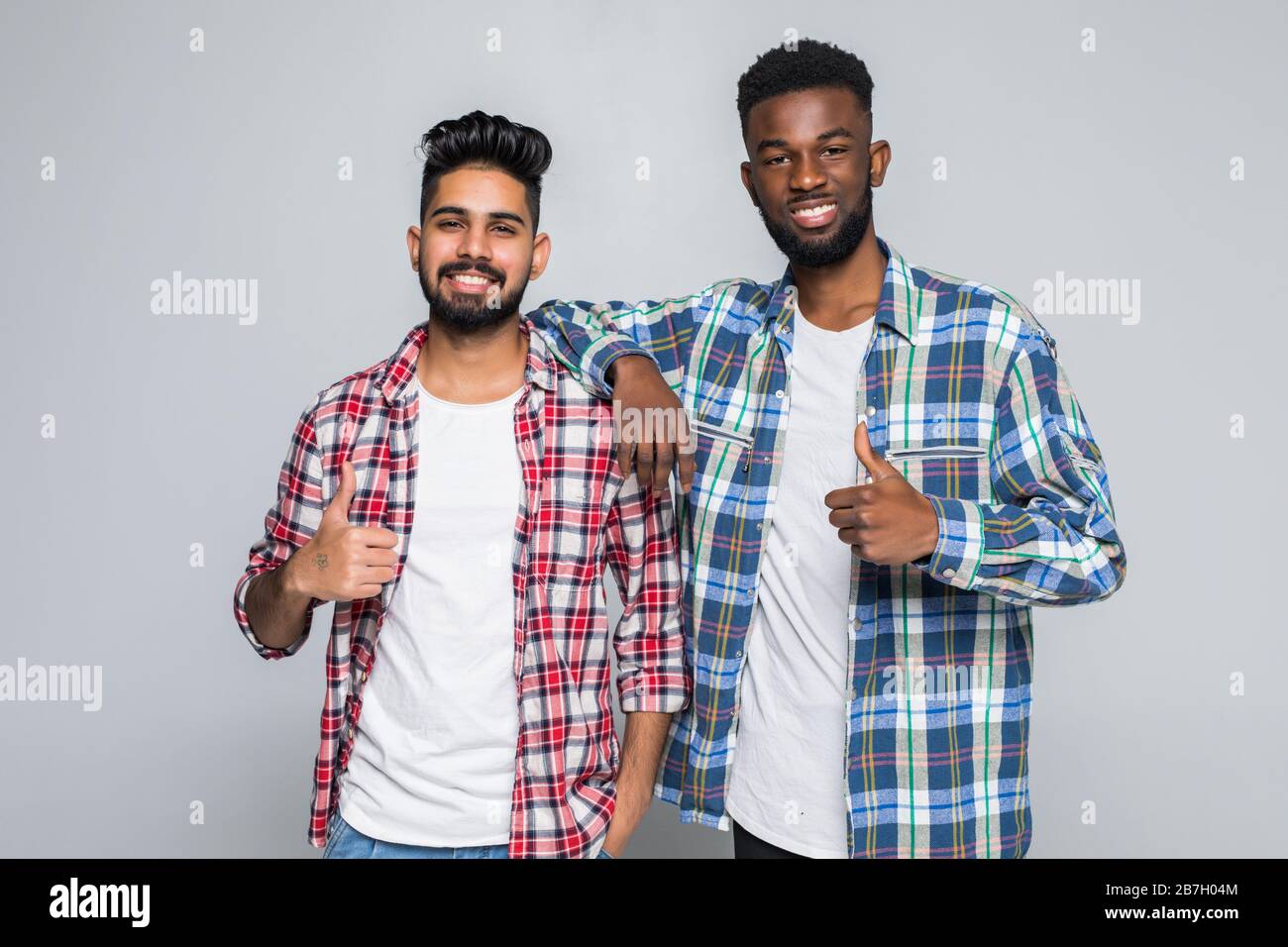 Portrait two brothers standing back hi-res stock photography and images ...