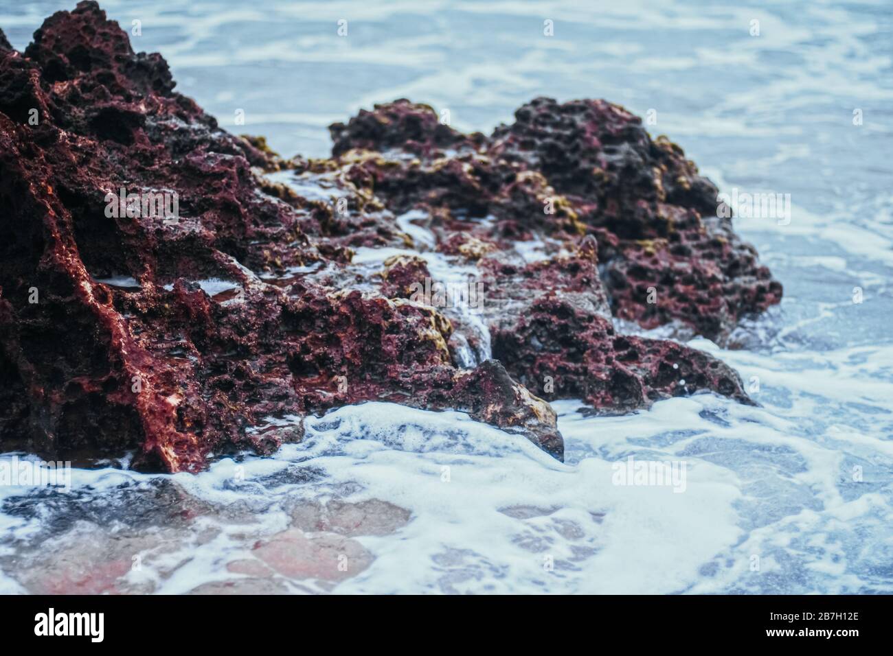 Storm in the ocean, sea waves crashing on rocks on the beach coast ...