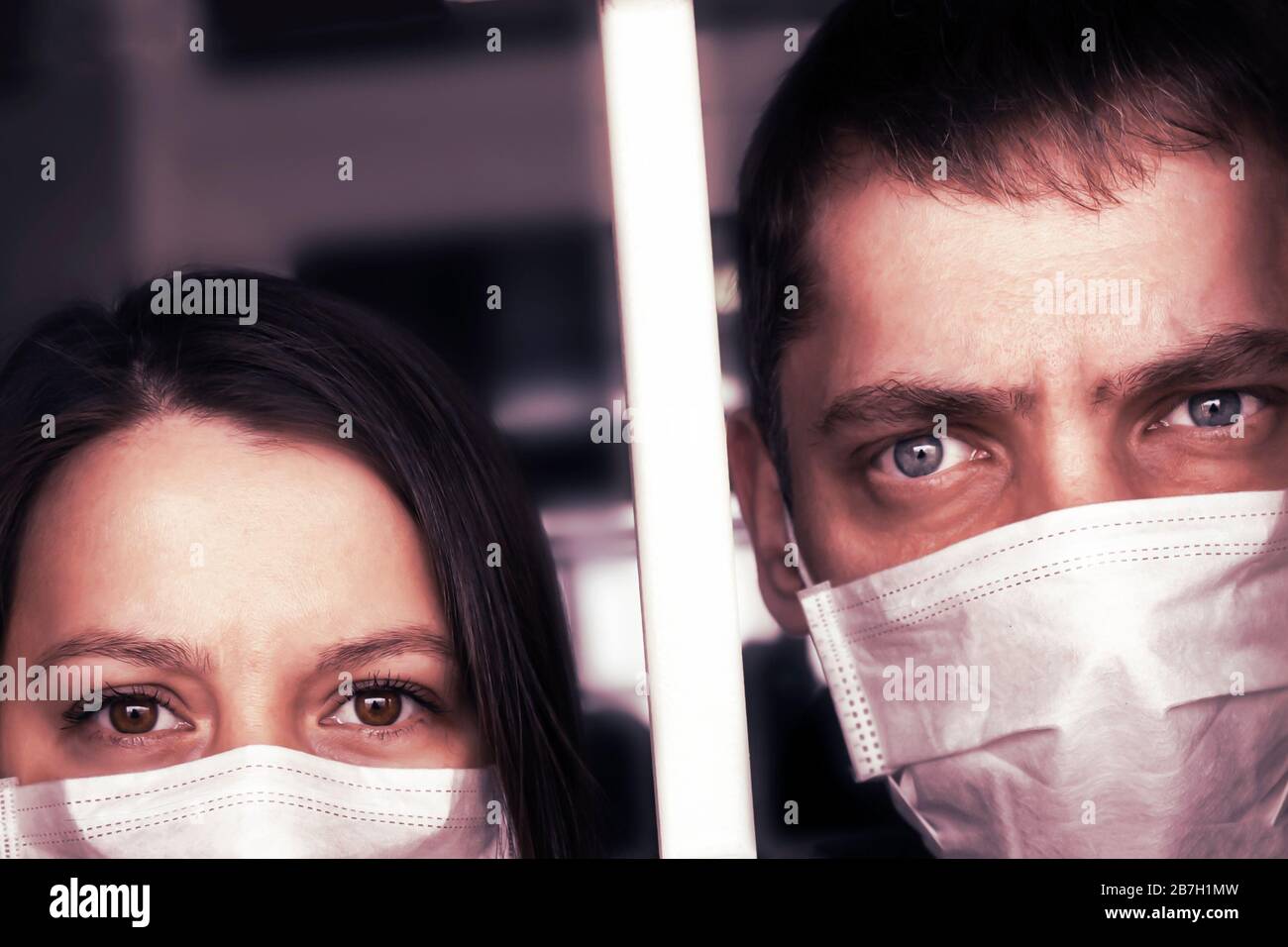Quarantine. A sick man and woman in protective medical masks look ...