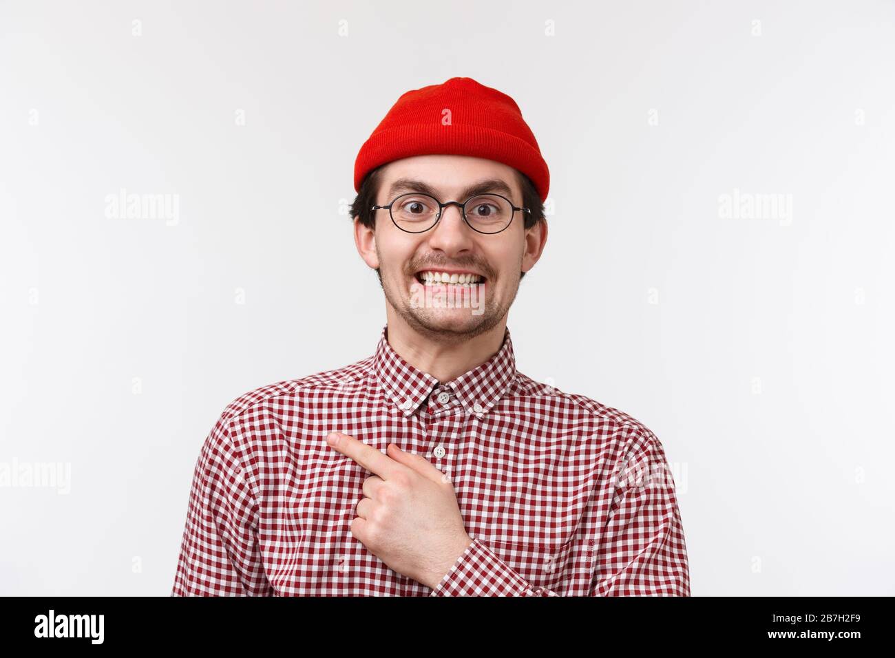 Close-up portrait excited handsome and cheerful young european man ...