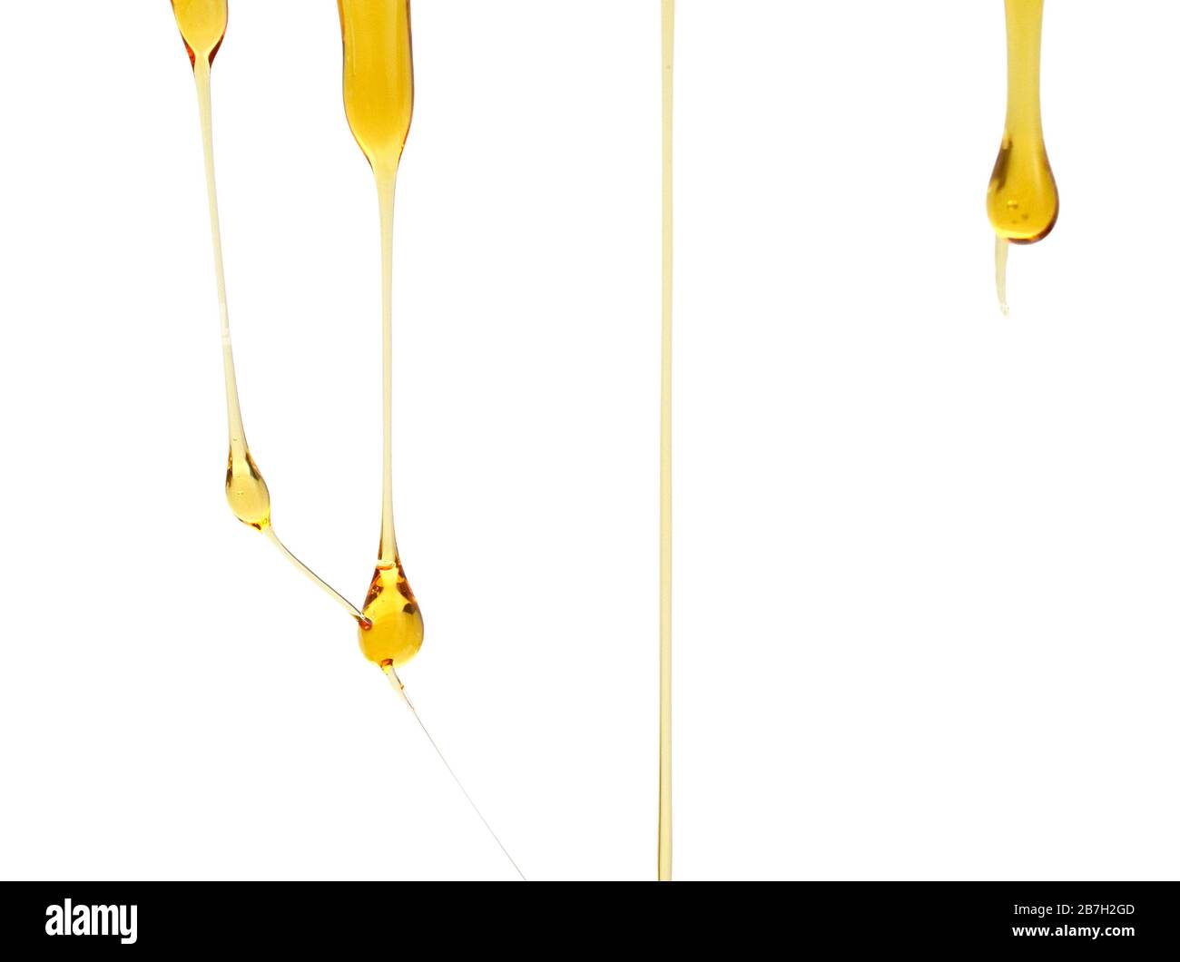 Transparent liquid drop dripping Cut Out Stock Images & Pictures - Alamy