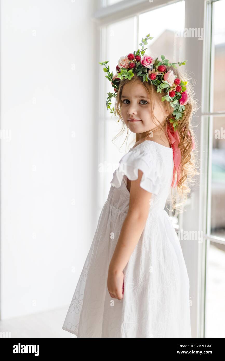 beautiful little girl playing on the window Stock Photo - Alamy